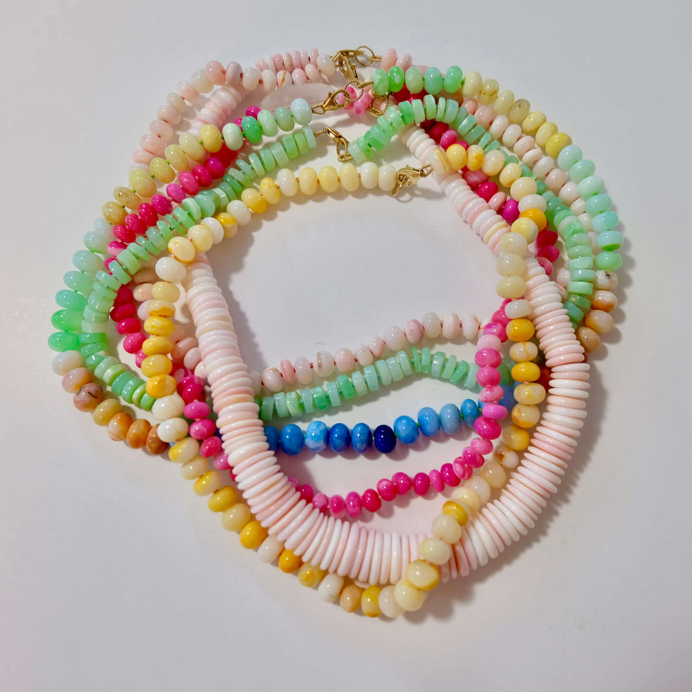 The Symbolism and Meaning of Red Jewelry – Coral Strands